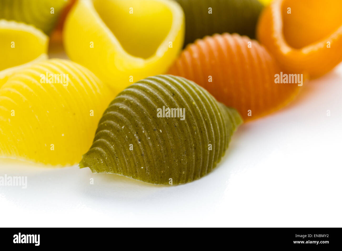 Multicolor shell pasta with tomato and spinach Stock Photo - Alamy
