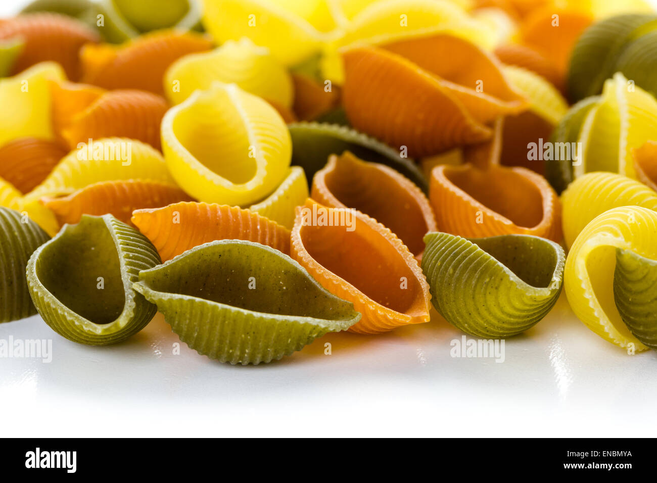 Multicolor shell pasta with tomato and spinach Stock Photo - Alamy