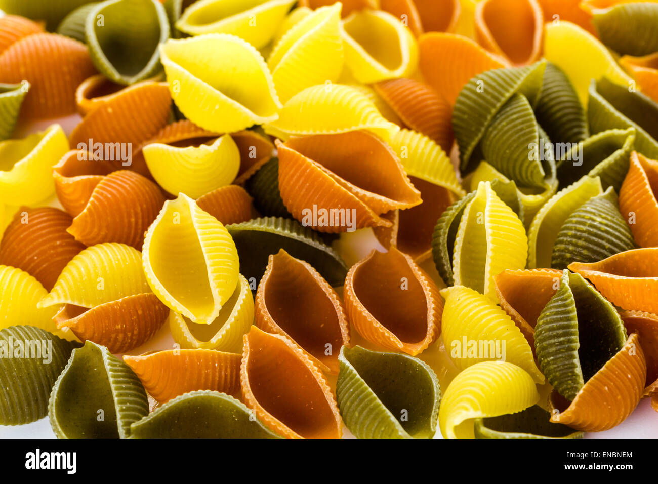 Multicolor shell pasta with tomato and spinach Stock Photo - Alamy