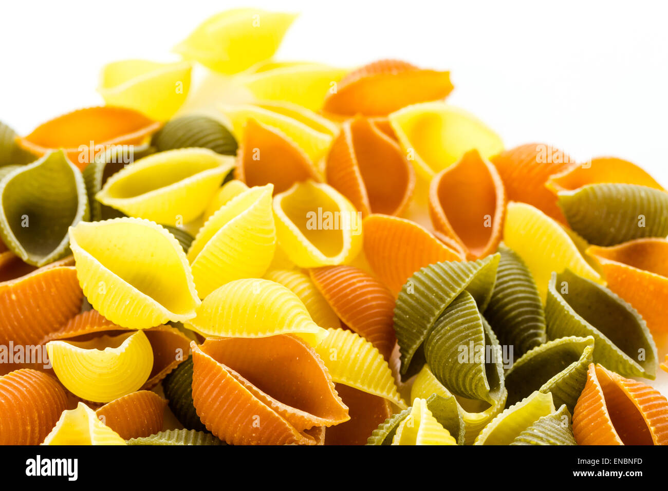 Multicolor shell pasta with tomato and spinach Stock Photo - Alamy