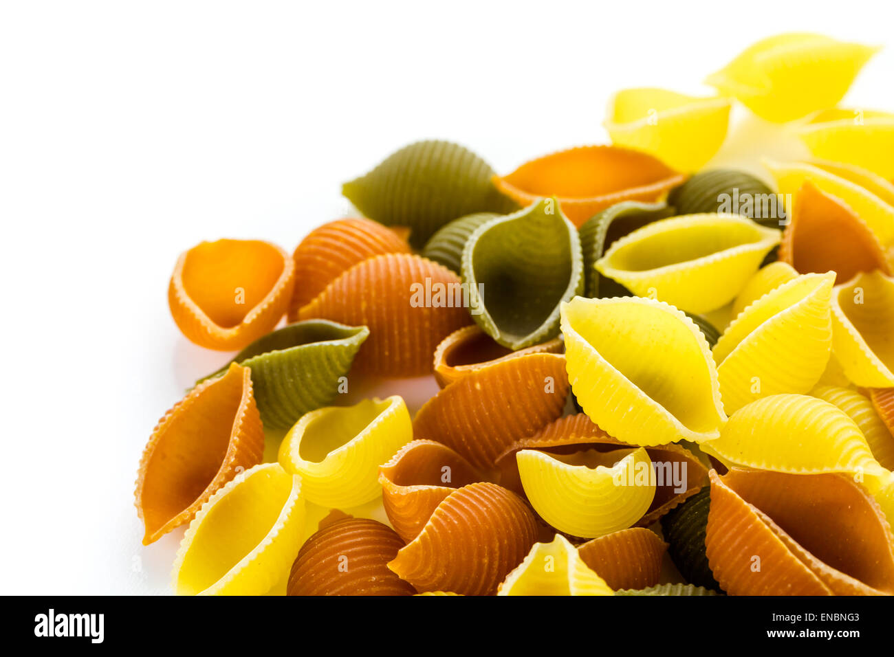 Multicolor shell pasta with tomato and spinach Stock Photo - Alamy