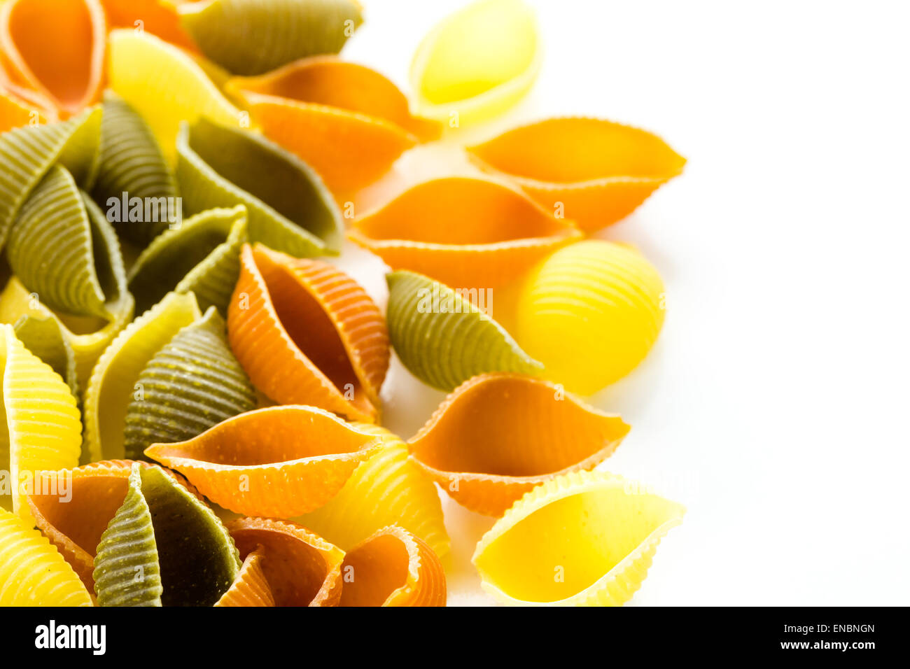 Multicolor shell pasta with tomato and spinach Stock Photo - Alamy