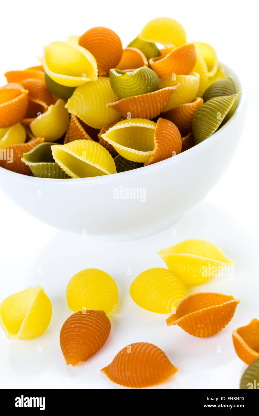 Multicolor shell pasta with tomato and spinach Stock Photo - Alamy