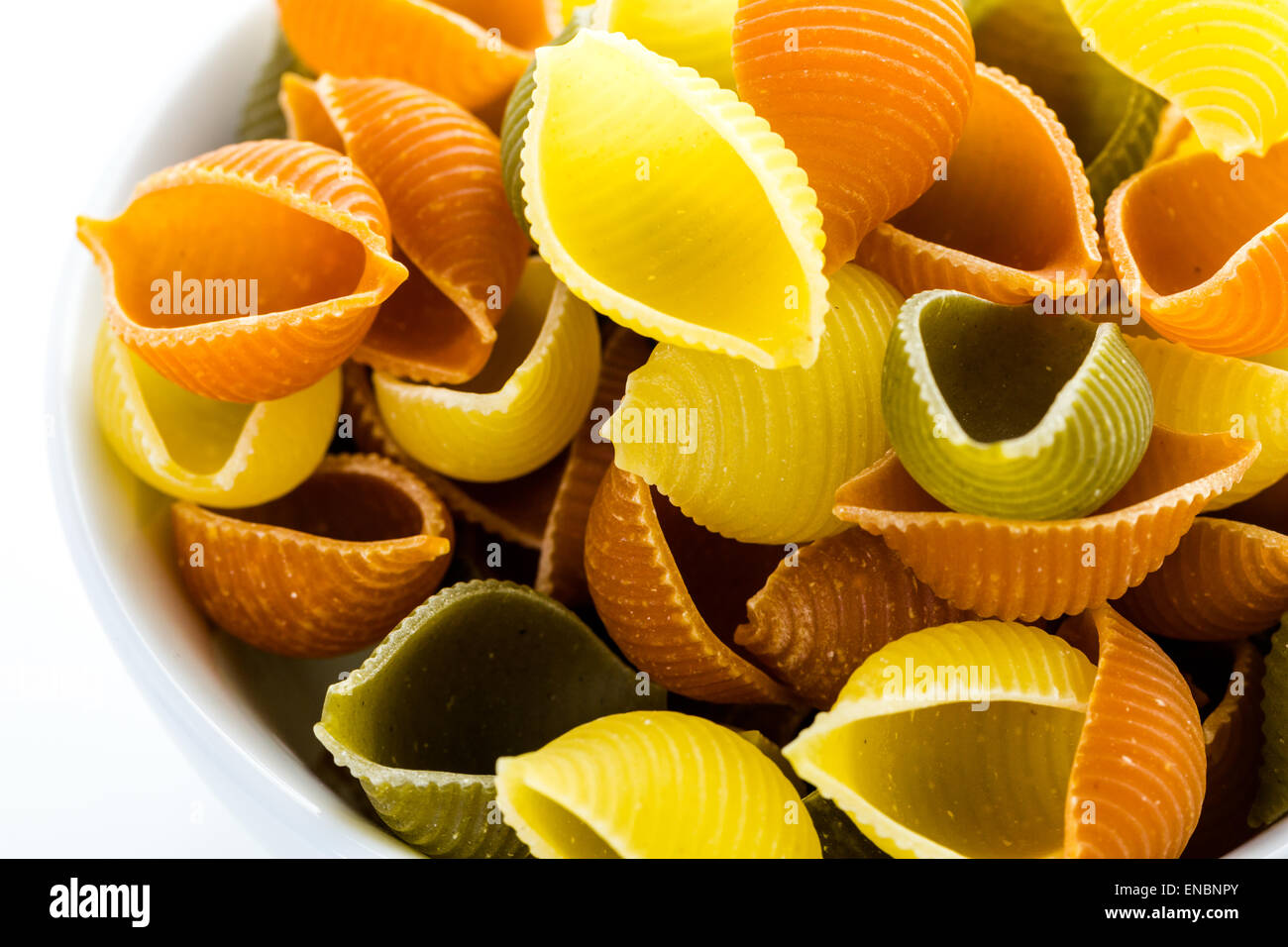 Multicolor shell pasta with tomato and spinach Stock Photo - Alamy