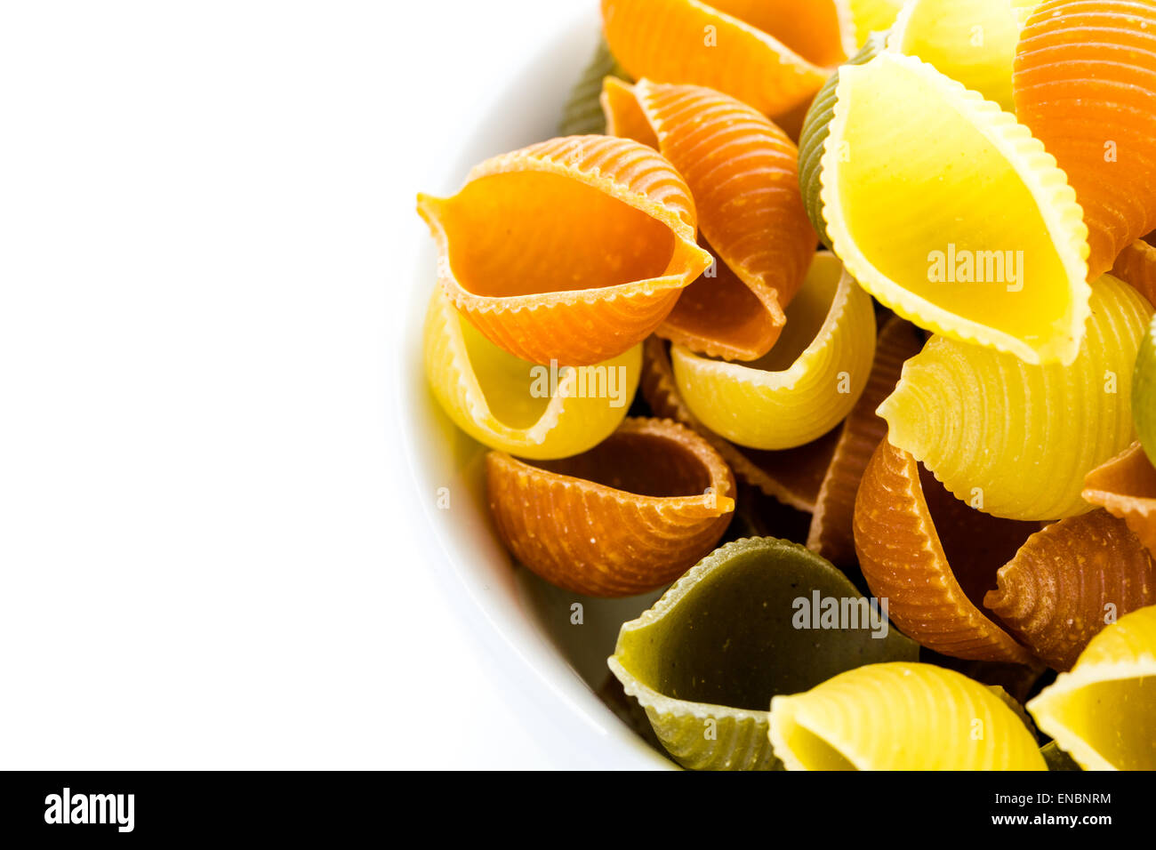 Multicolor shell pasta with tomato and spinach Stock Photo - Alamy