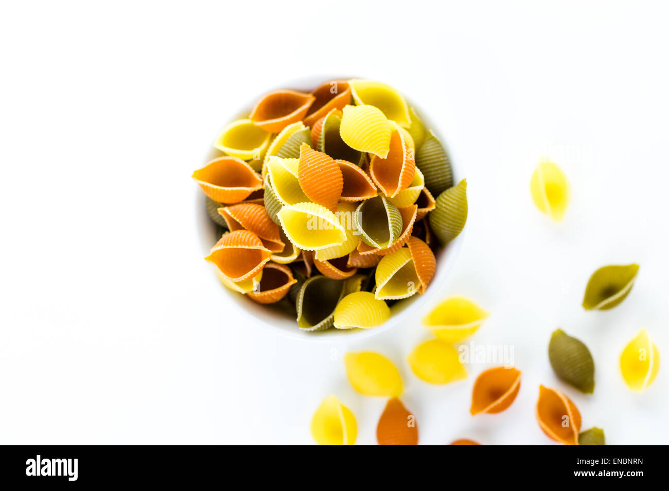 Multicolor shell pasta with tomato and spinach Stock Photo - Alamy