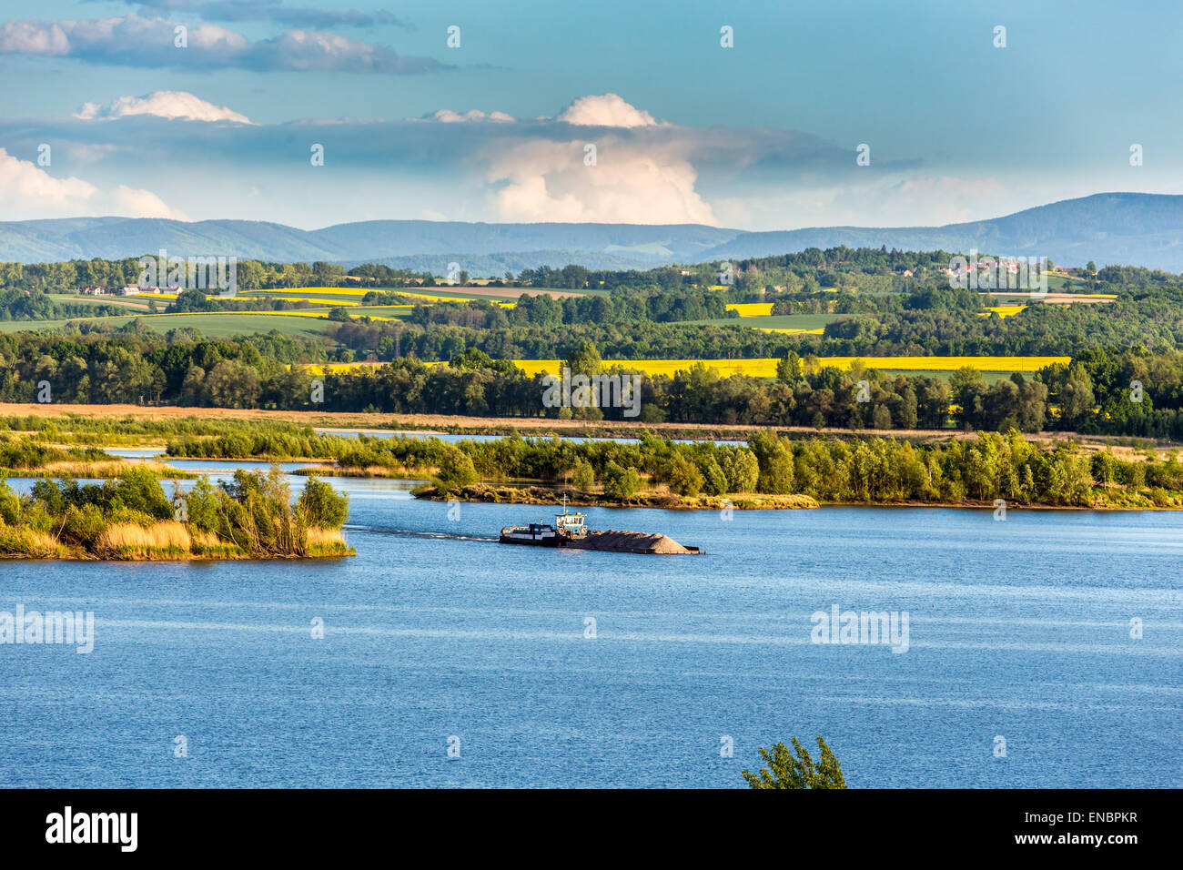 The barge with the sand on the lake Stock Photo - Alamy