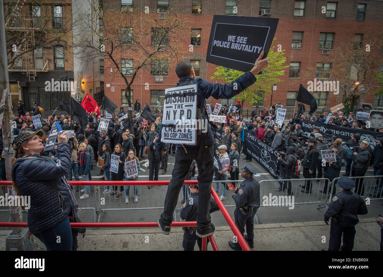 Manhattan, New York, USA. 1st May, 2015. Activists march as part of May ...