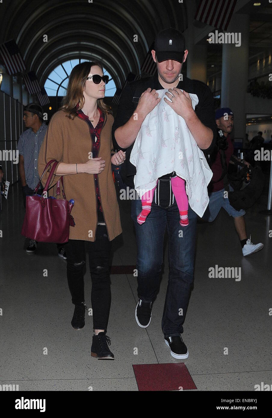 Emily Blunt and family arrive at Los Angeles International Airport (LAX ...