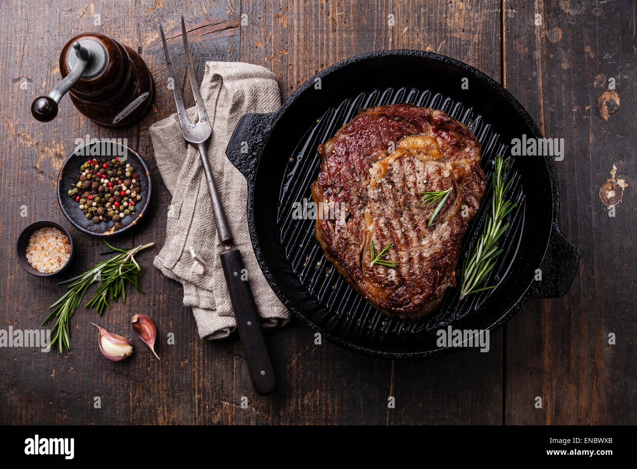 Grilled Black Angus Steak on grill iron pan on wooden background Stock ...