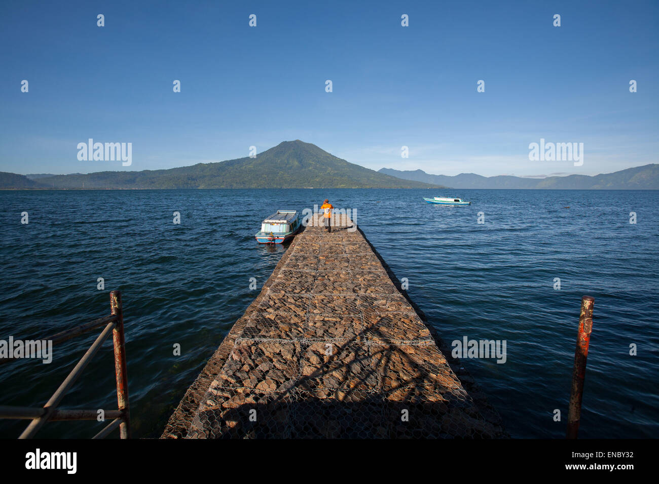 Jetty on Lake Ranau with Mount Seminung in the background are ...