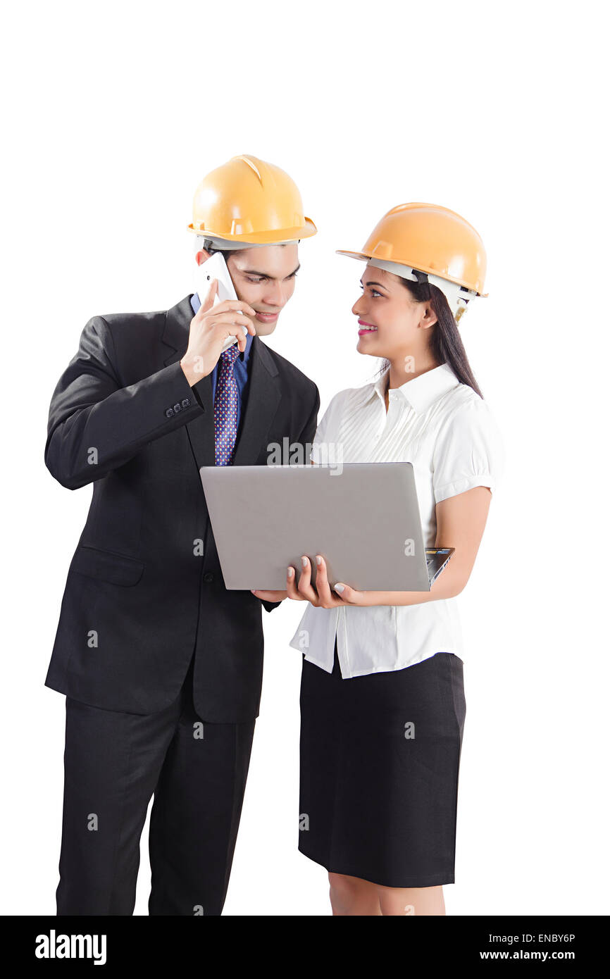 Woman on laptop with mobile phone Cut Out Stock Images & Pictures - Alamy