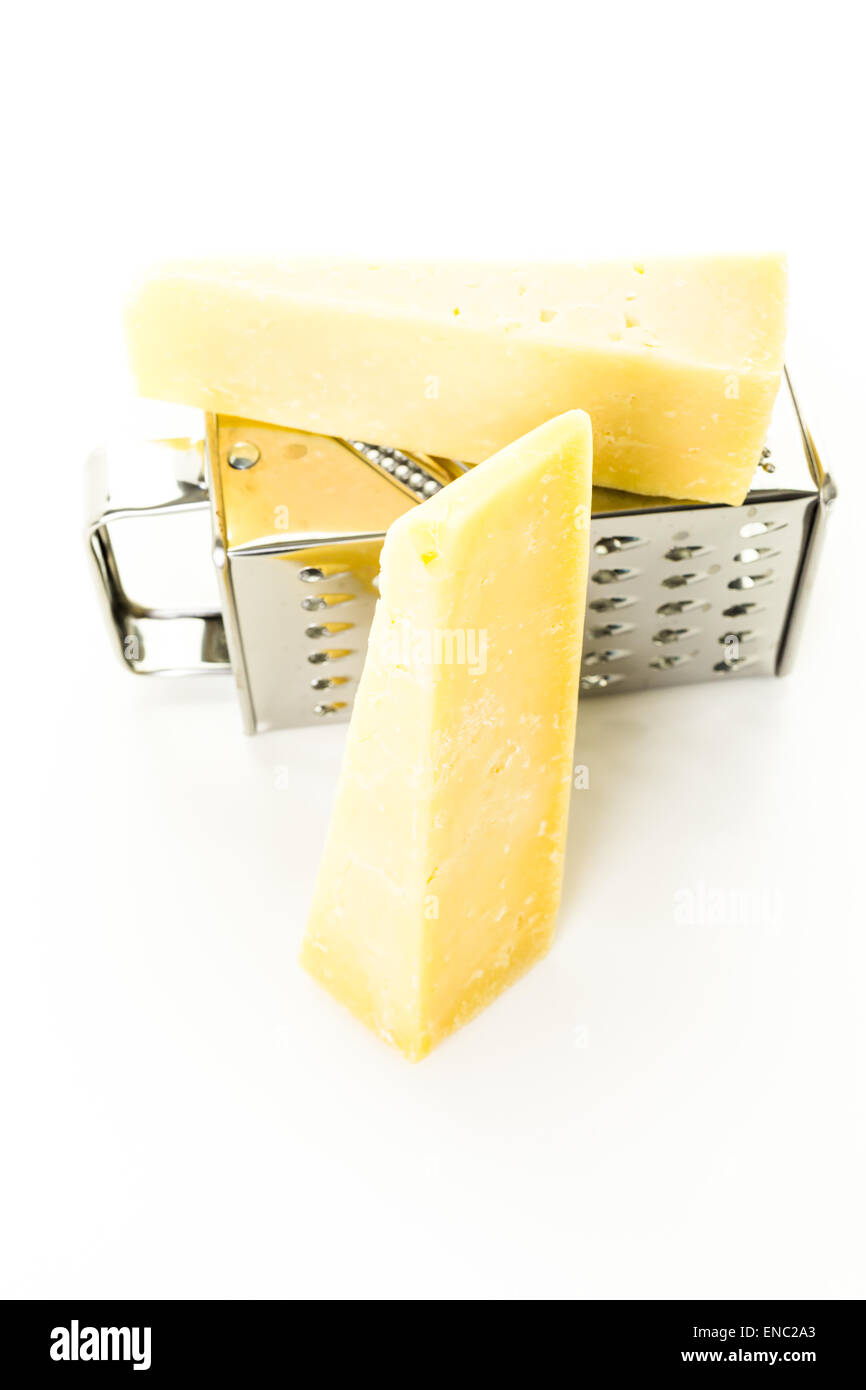 Slice of parmesan cheese on the board Stock Photo - Alamy