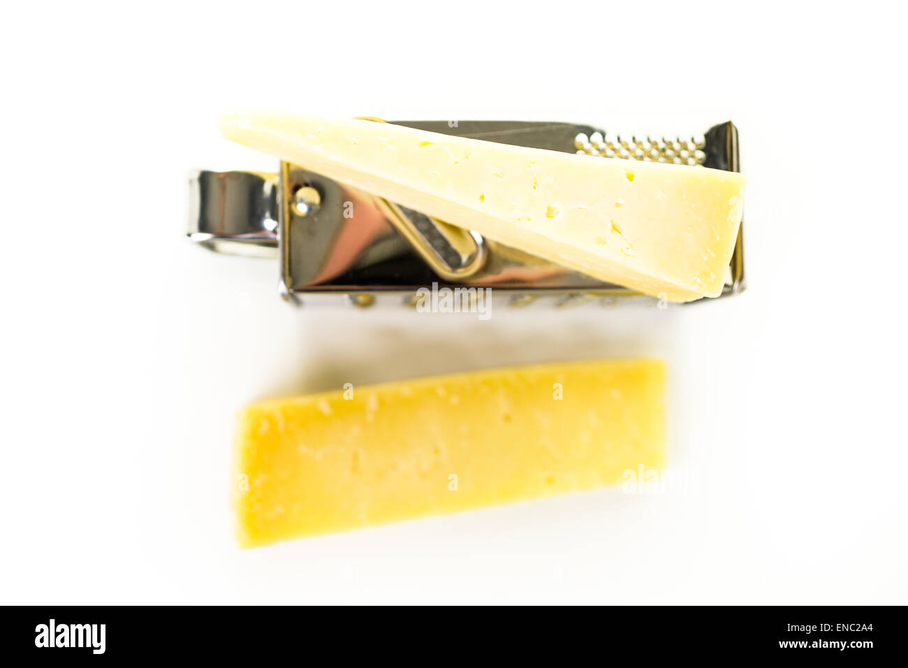 Slice of parmesan cheese on the board Stock Photo - Alamy