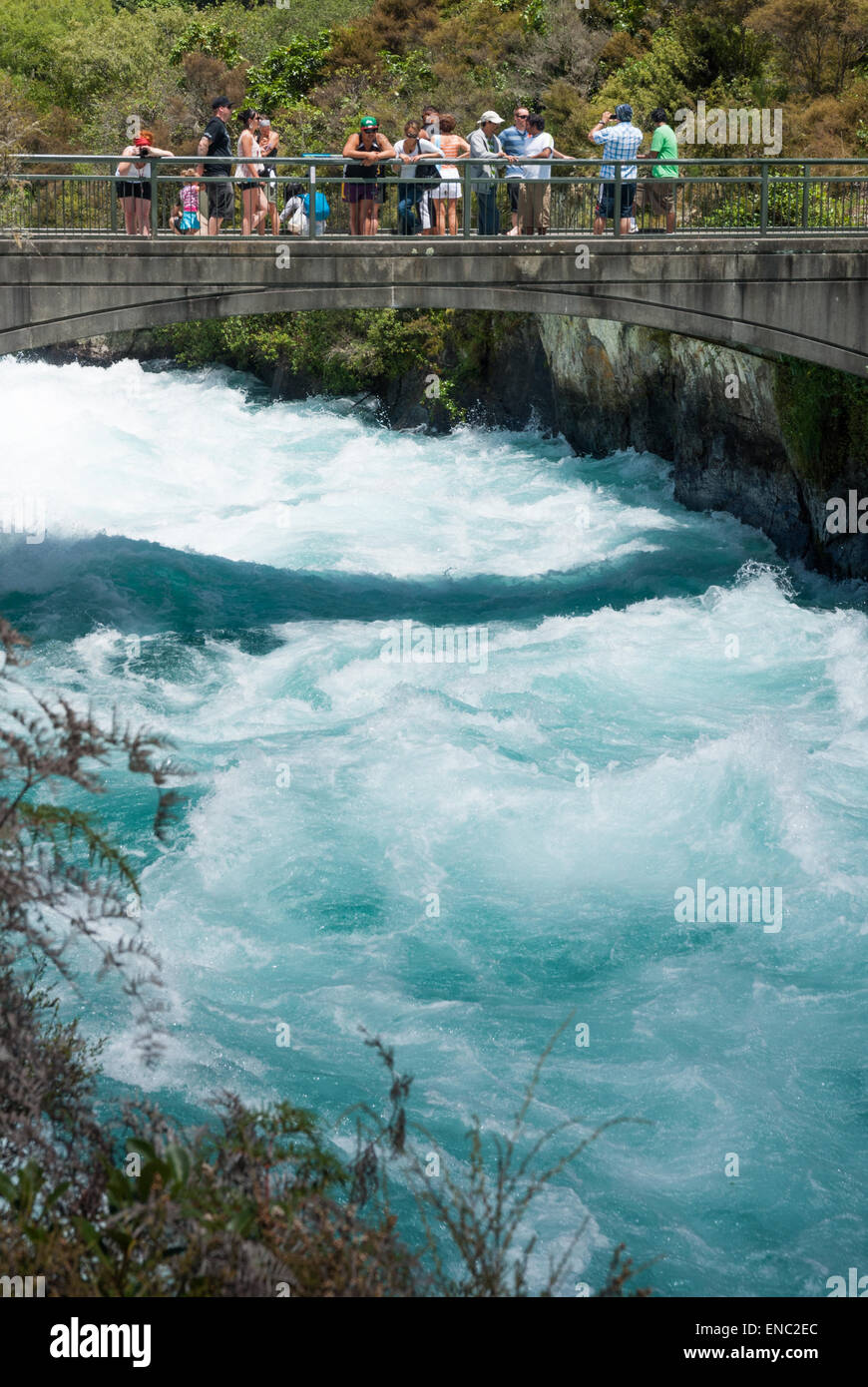 Tourists enjoying the sight of the raging rapids at Huka Falls on the ...