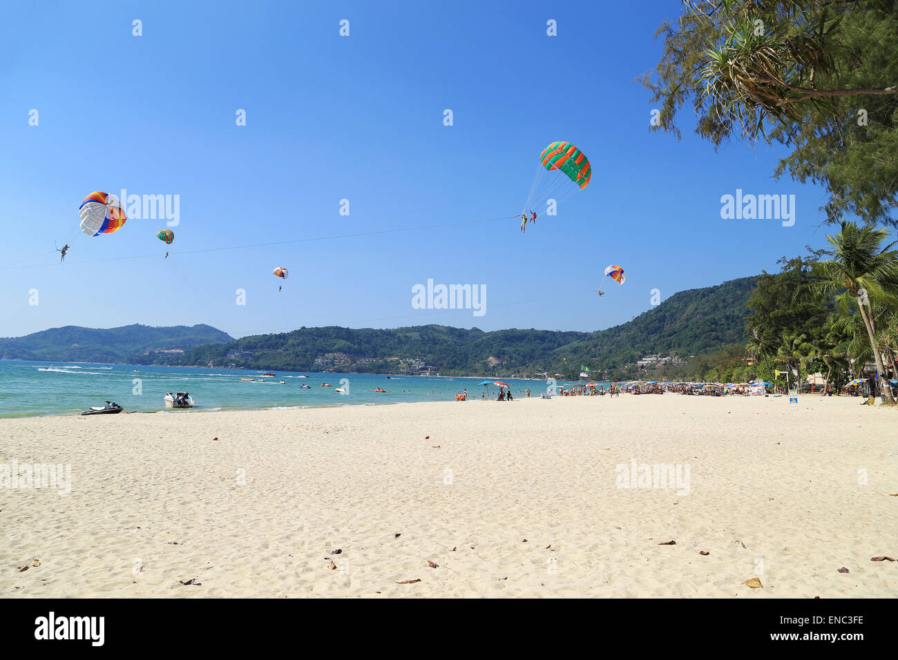 view of Patong Beach with parasailing (Thailand extreme Sports) at ...