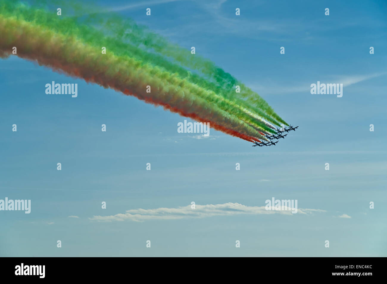 tricolor arrows on exhibition in the blue sky, Italy Stock Photo - Alamy