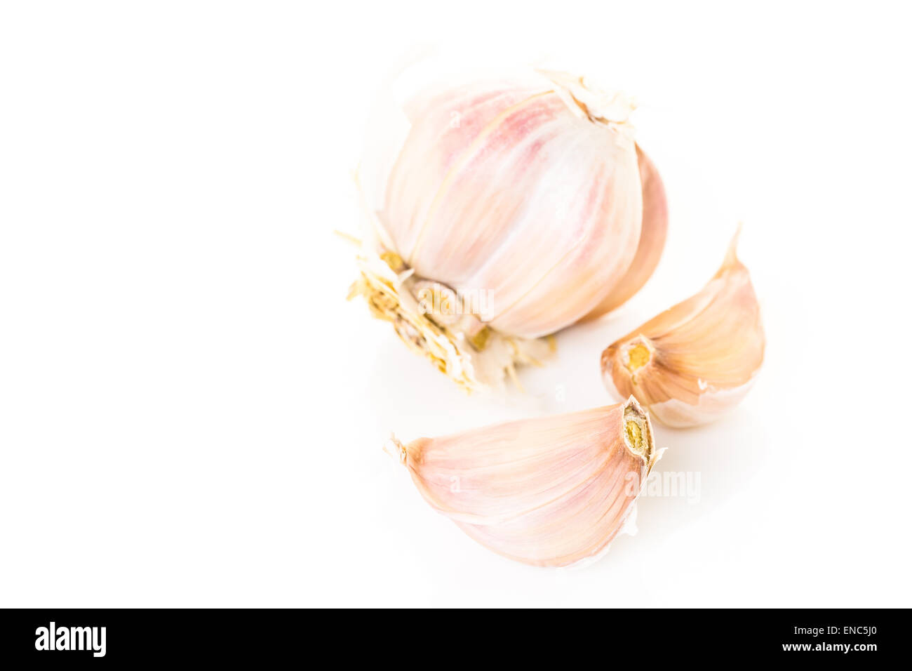 Organic garlic on a white background Stock Photo - Alamy