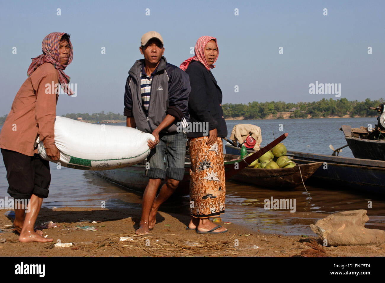 Man carrying heavy bag rice hi-res stock photography and images - Alamy