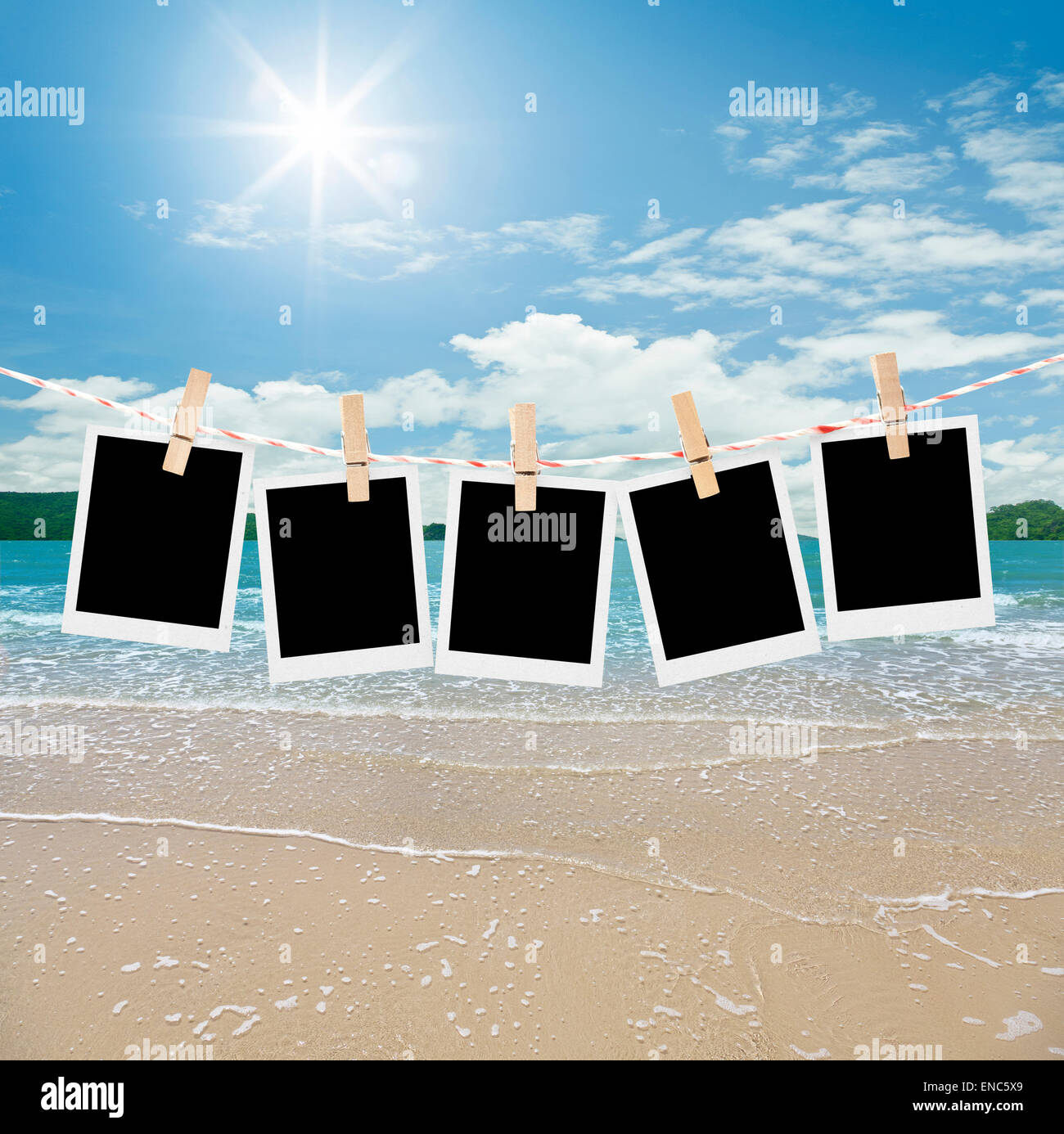 empty five photos hanging on beach Stock Photo - Alamy