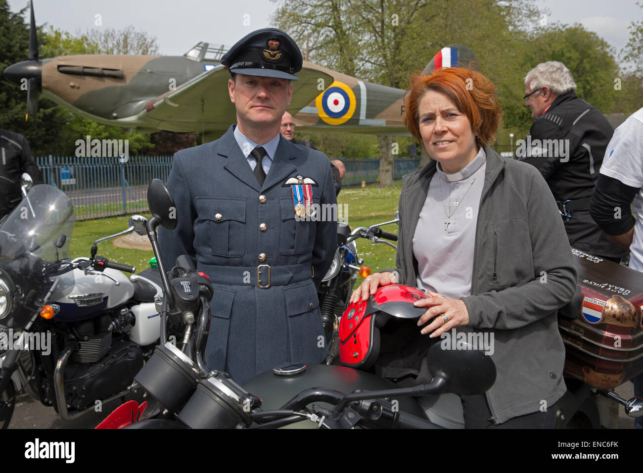 James Whitworth from 100 squadron poses with Minister Carol Morrison as ...