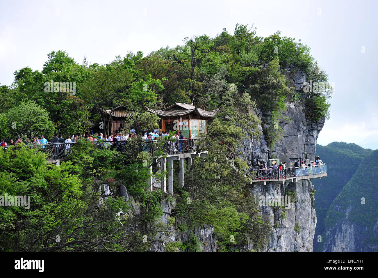 Zhangjiajie, China's Hunan Province. 2nd May, 2015. Tourists walk on a ...