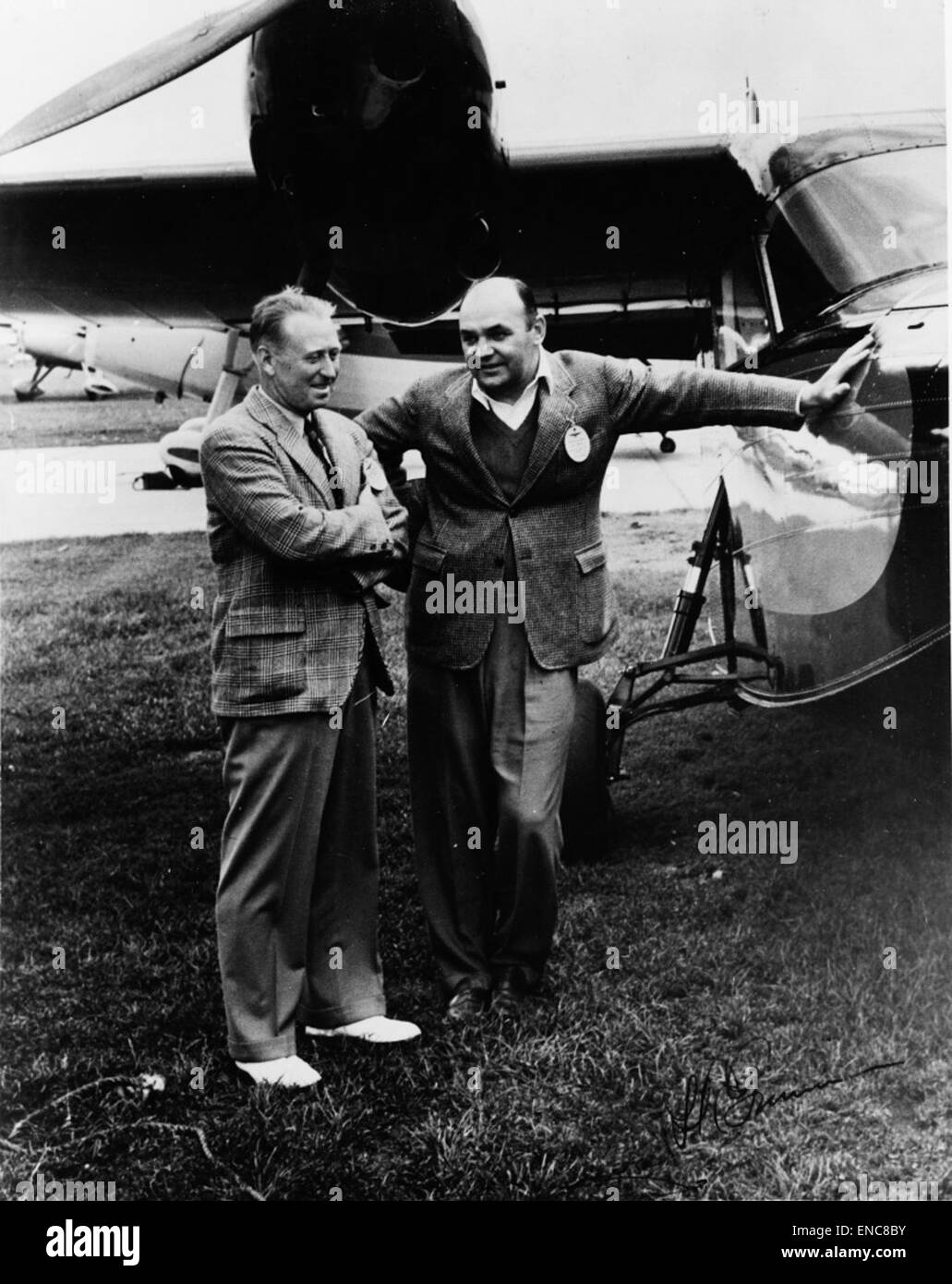 This photograph shows Roy Grumman and Jake Swirbul alongside the ...