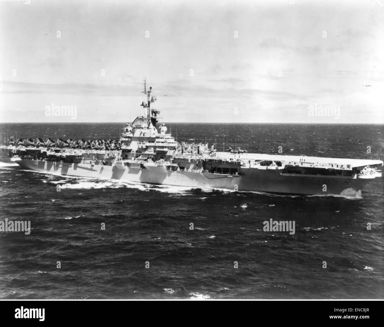 A photograph of the USS Essex (CV-9), an aircraft carrier of the United ...
