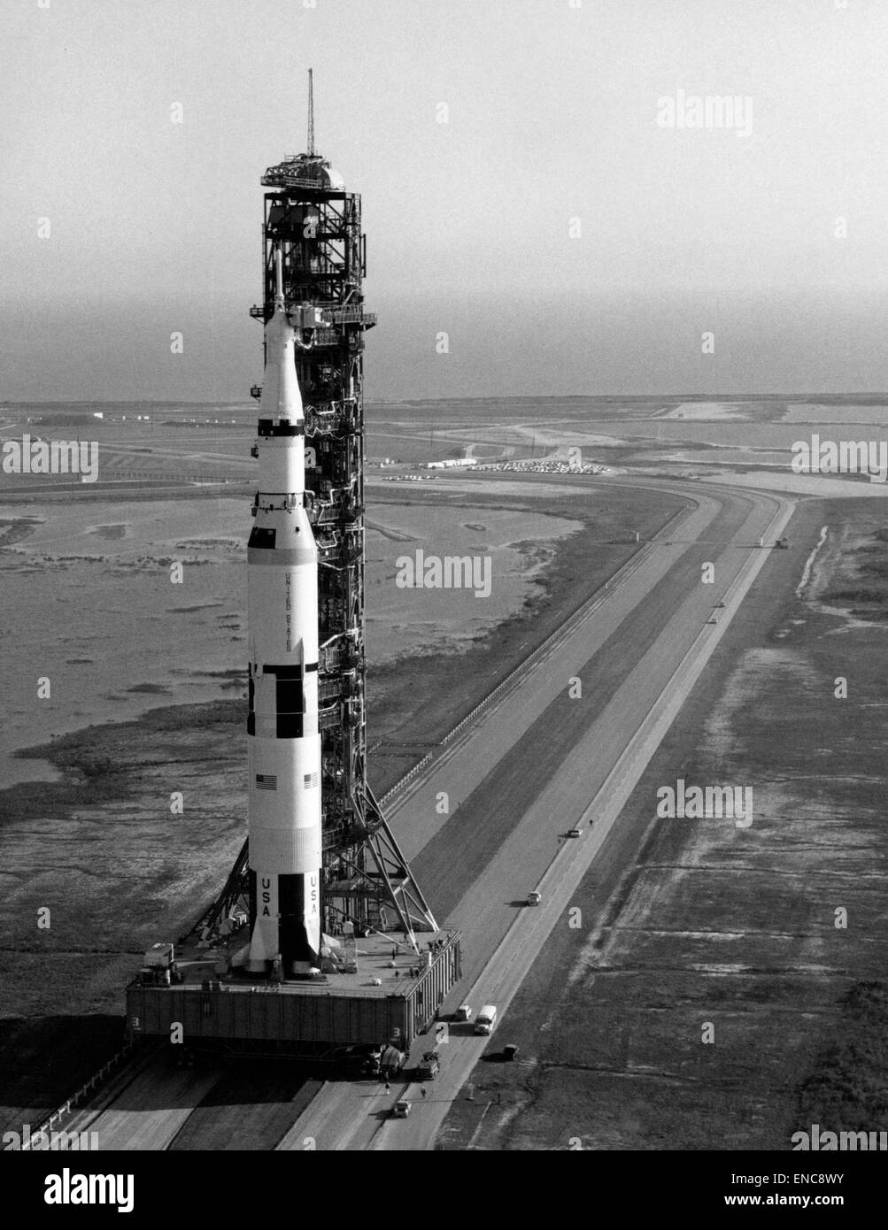 This photograph shows the Apollo 13 spacecraft being rolled out to the ...