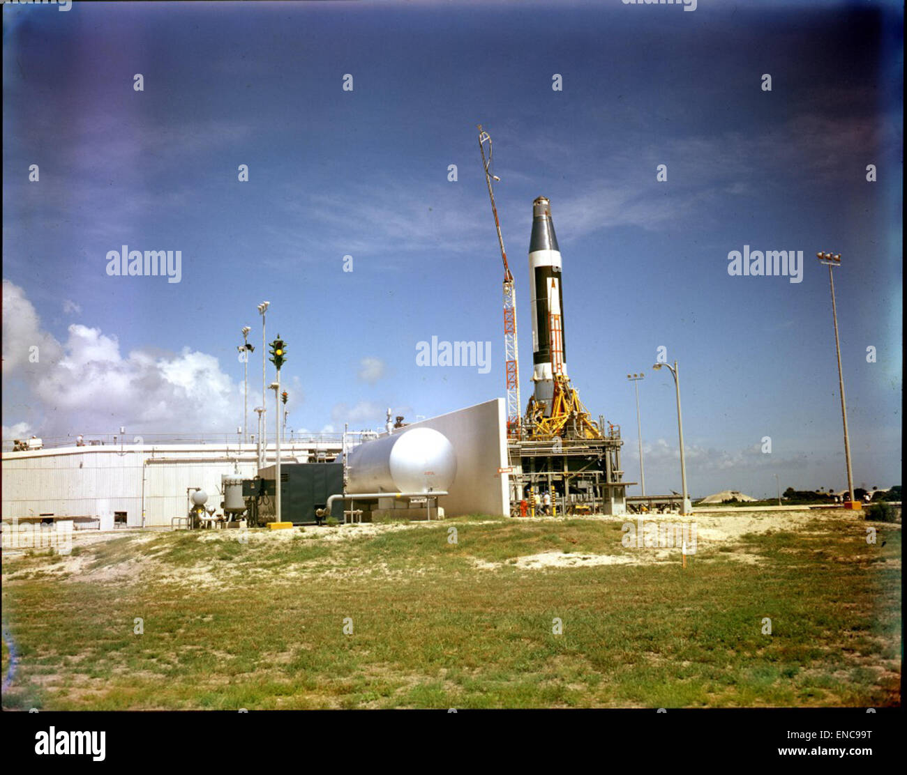 The Atlas 3B rocket is shown on its launch pad in a pre-launch ...