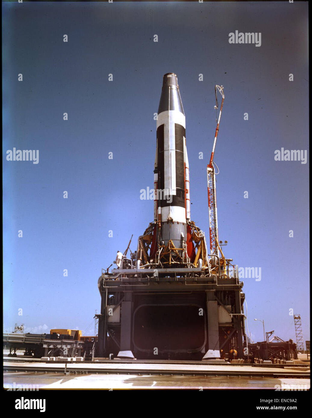 A photograph of the Atlas 3B missile on its launch pad, captured in its ...