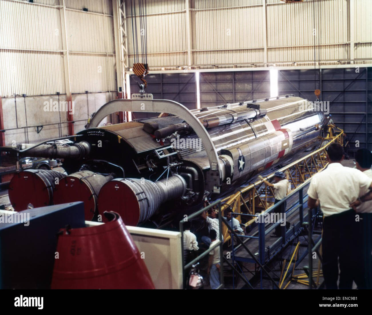 A photograph showing the Atlas 9C missile being weighed in Building 5 ...