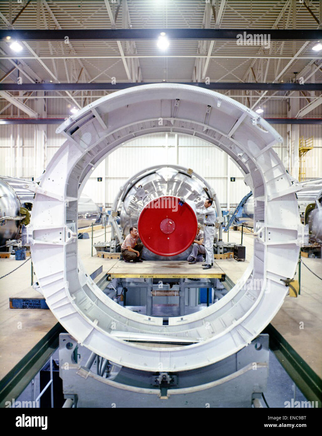 An image showcasing the assembly line for the Atlas missile system ...