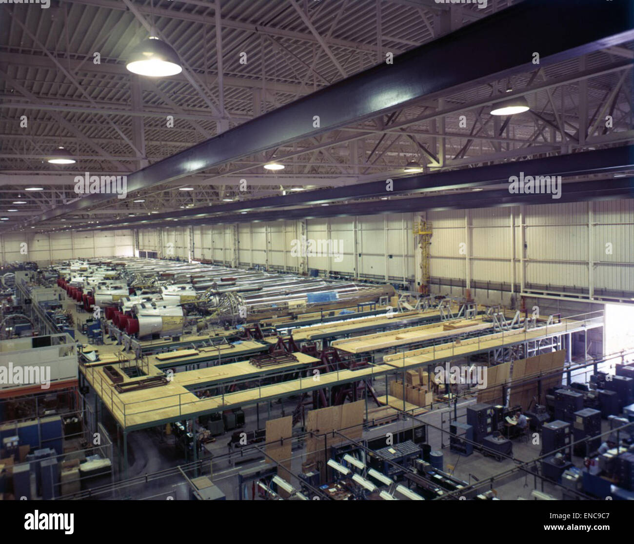 This image documents the assembly process of the Atlas missile ...