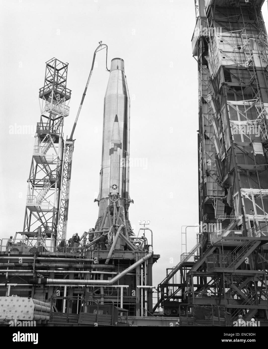 An Atlas missile positioned on its launch pad, ready for a test or ...