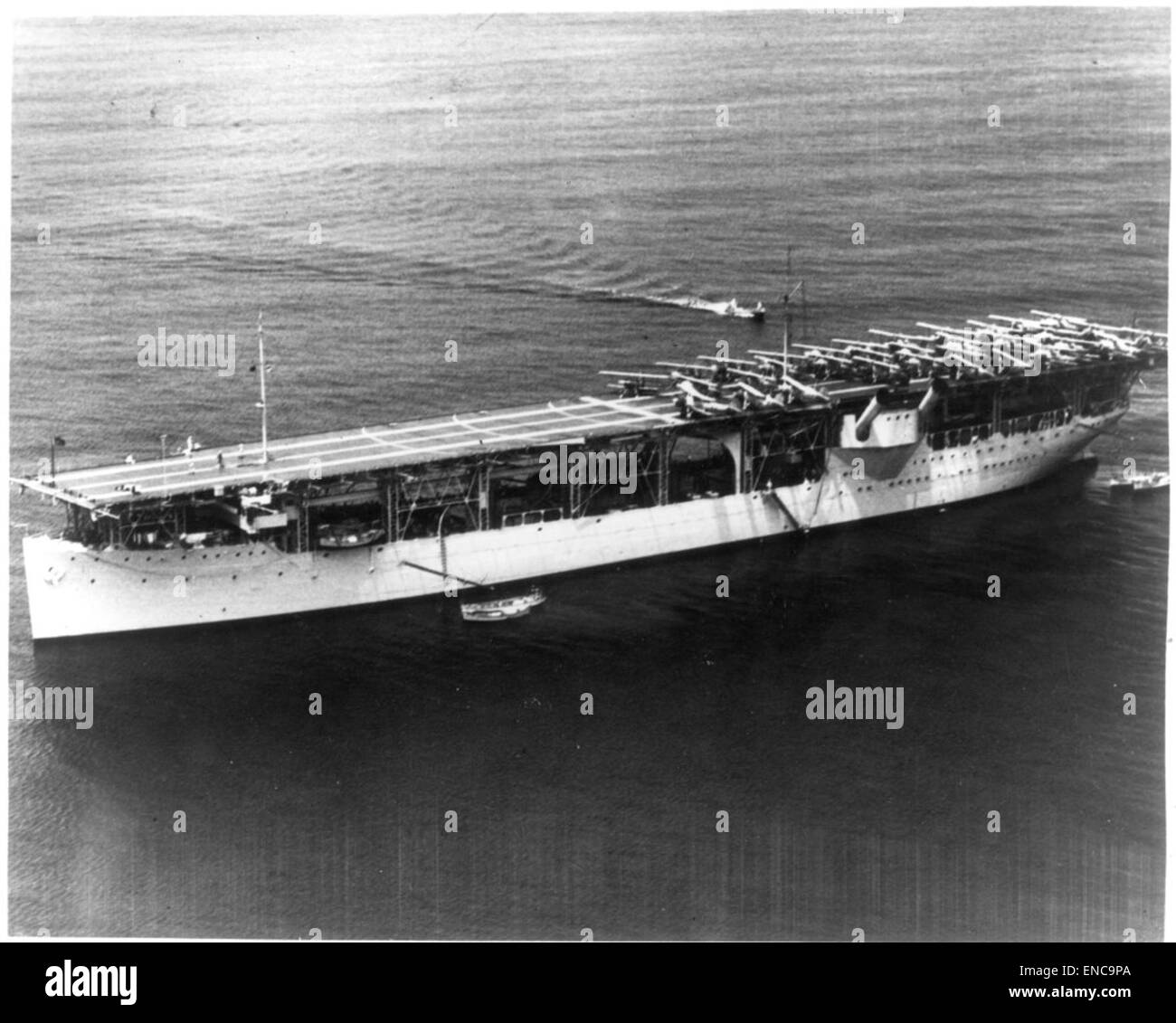 This photograph features the USS Langley (CV-1), the first U.S. Navy ...