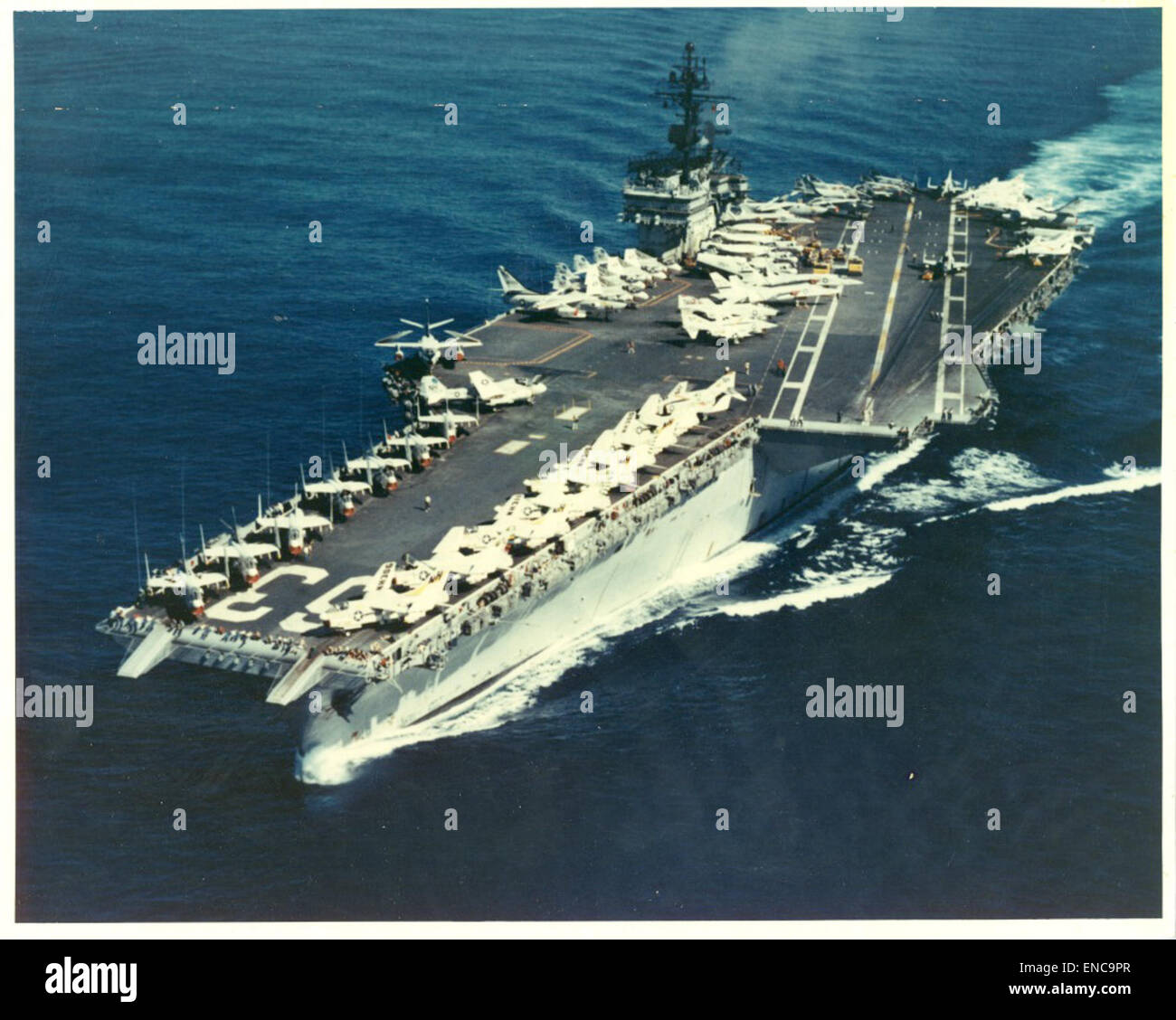 This photograph shows the USS Kitty Hawk (CVA-63), an aircraft carrier ...