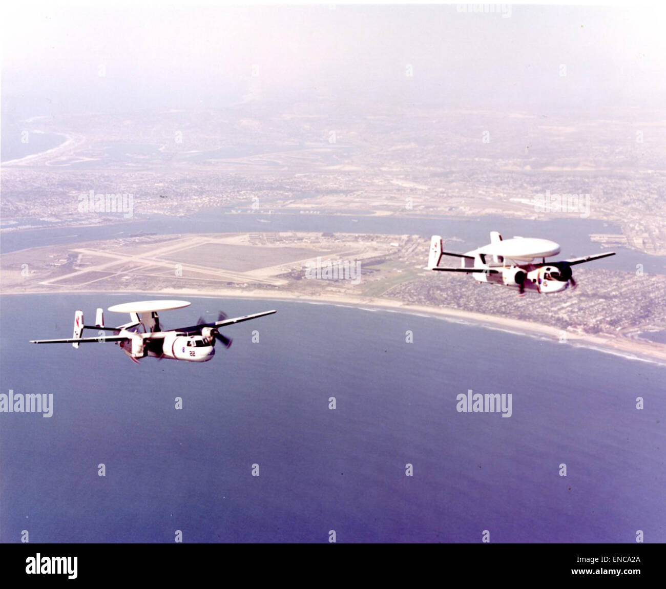 A photograph showing two Grumman aircraft models, the WF-2 and W2F-1 ...