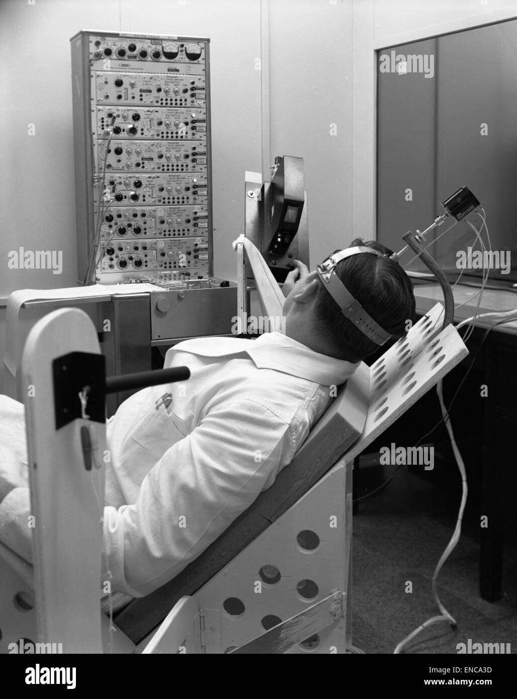 A photograph depicting a human test subject during an experiment ...