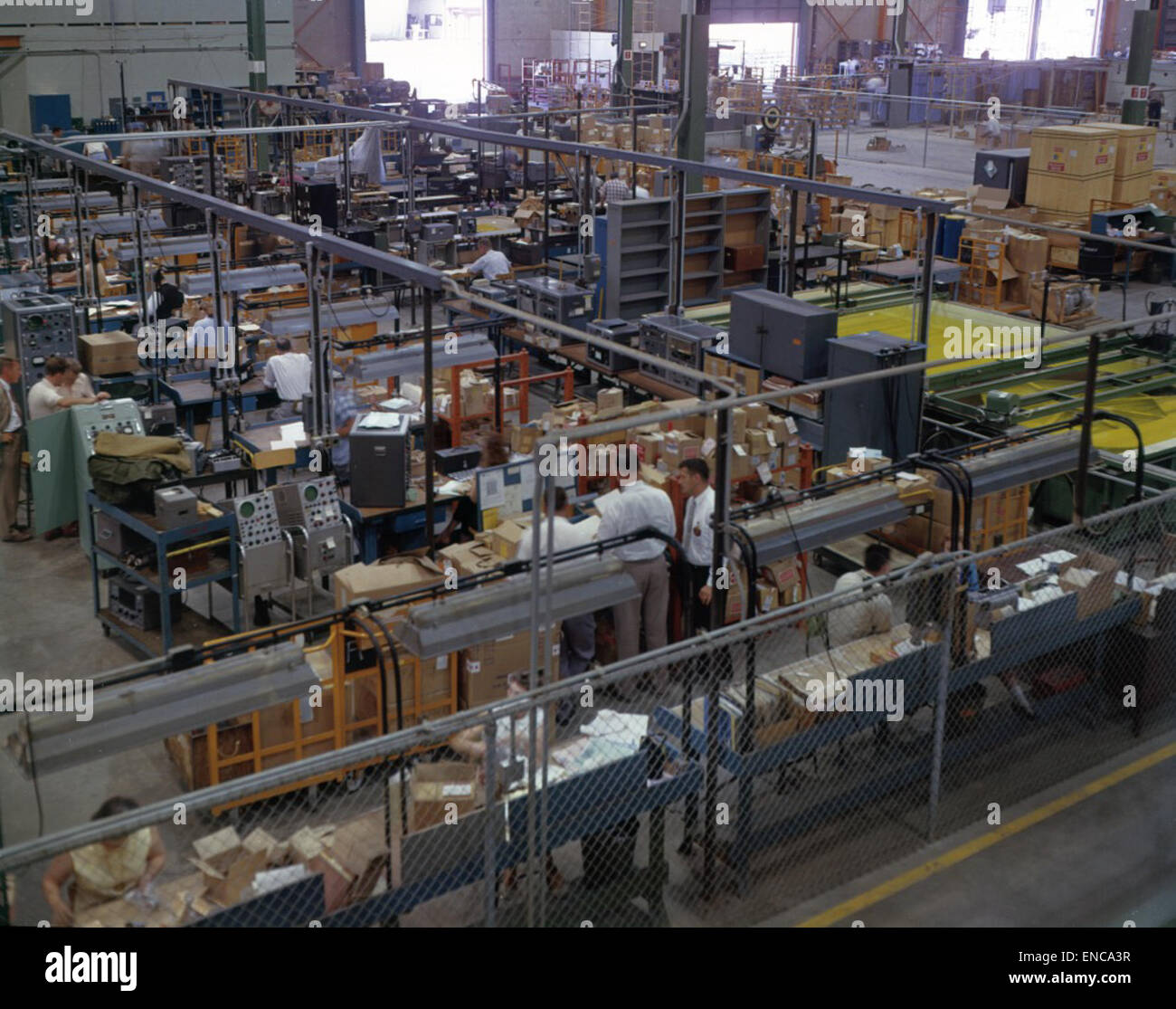 A photograph showing workers in the inspection department, likely in ...