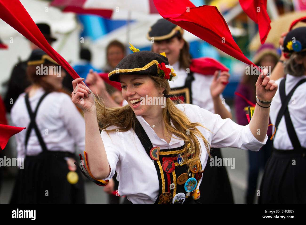 Female Morris clog dancer with bib and soft hat in Skipton, Yorkshire ...