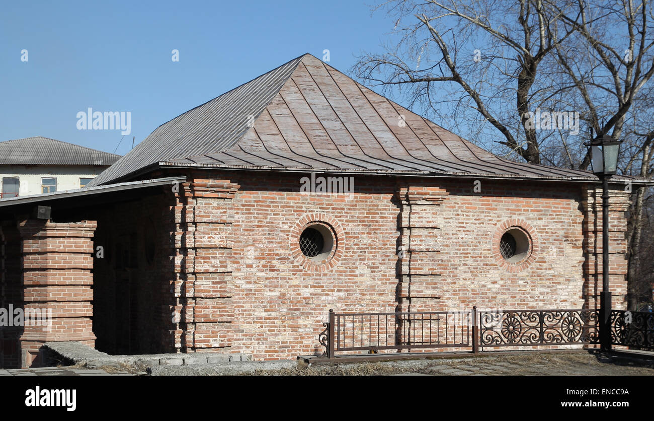 An example of an old brick house with small round windows Stock Photo ...
