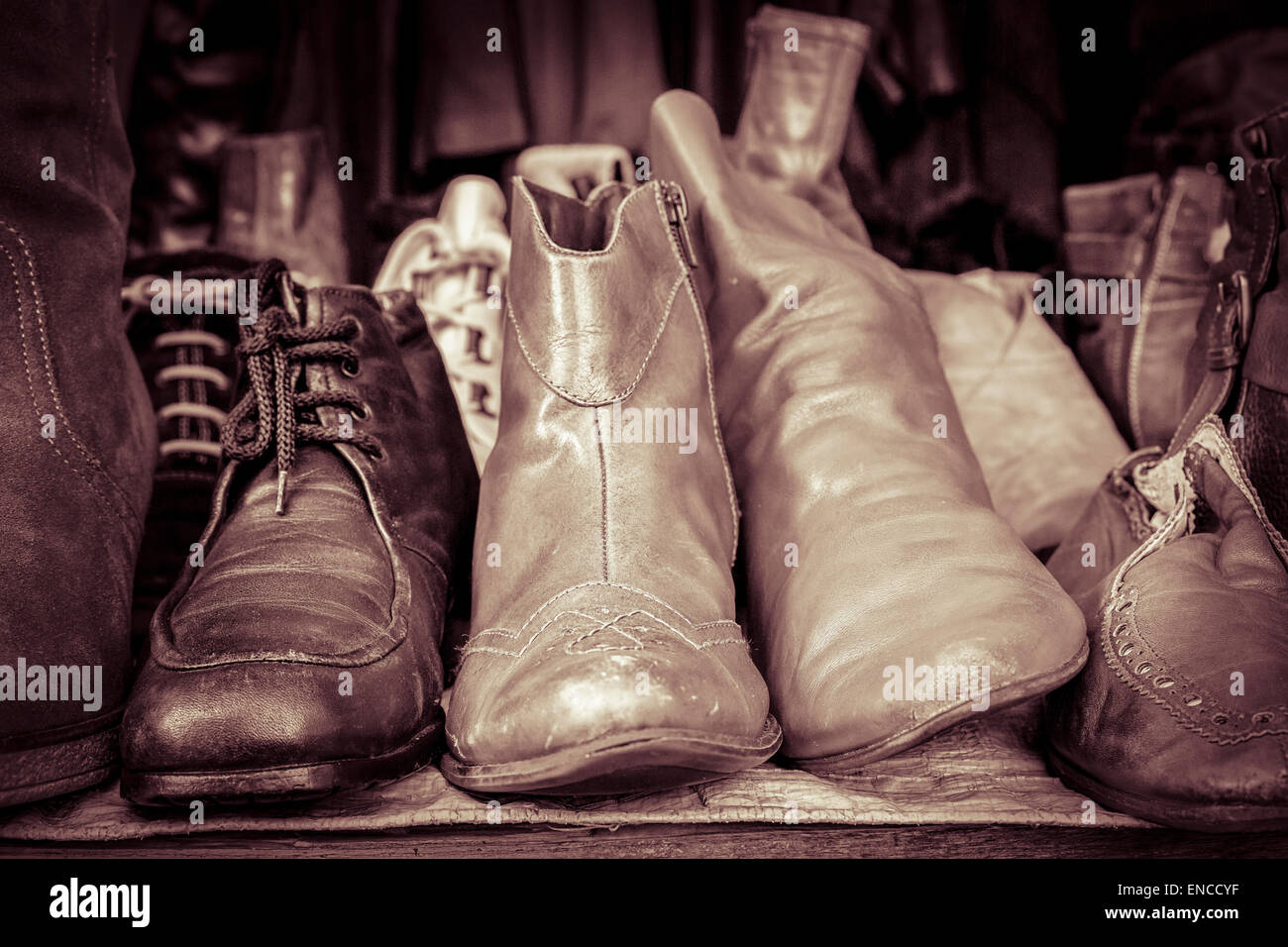 some old shoes on a flea market stall Stock Photo - Alamy