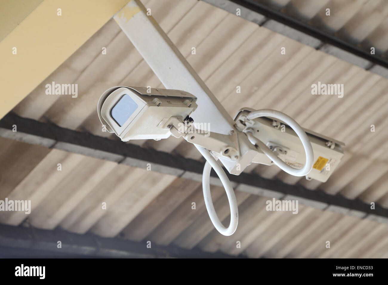 Security Camera or CCTV with roof background Stock Photo - Alamy