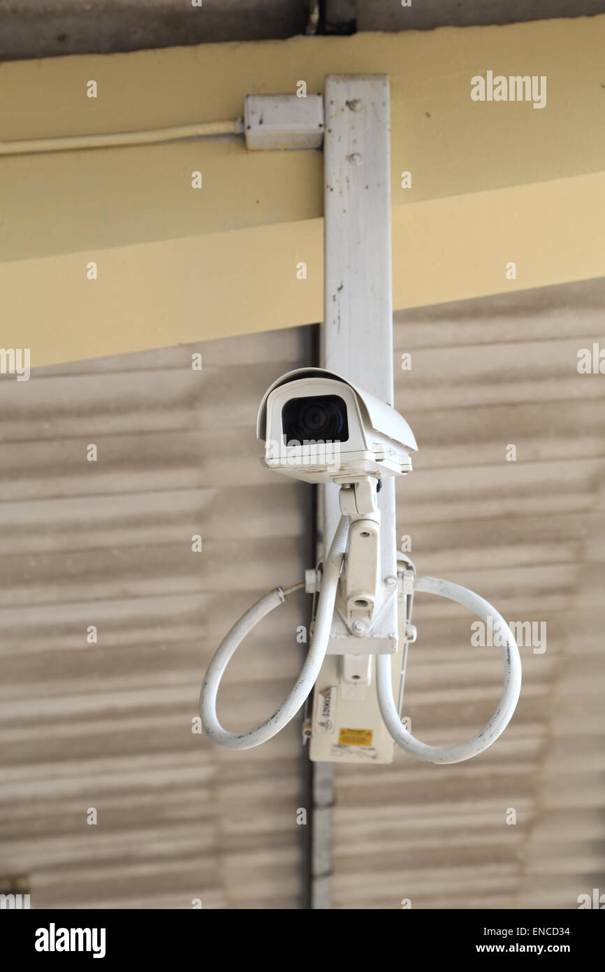 Security Camera or CCTV with roof background Stock Photo - Alamy