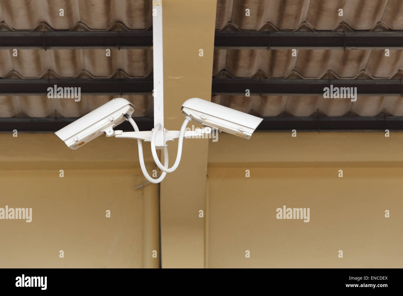 Security Camera or CCTV with roof background Stock Photo - Alamy