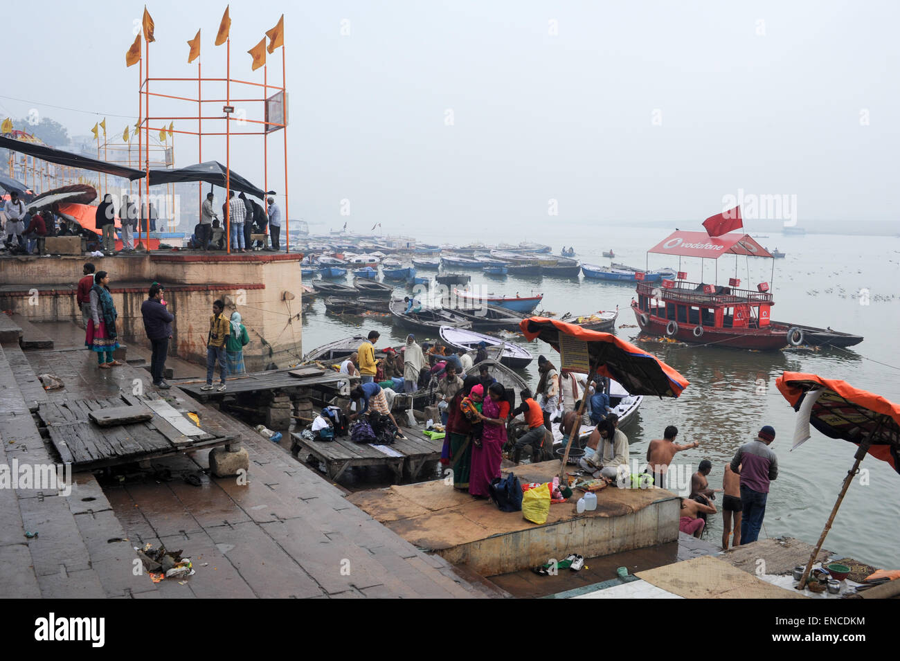 Varanasi, India - 27 January 2015: Hindu pilgrims take a holy bath in ...