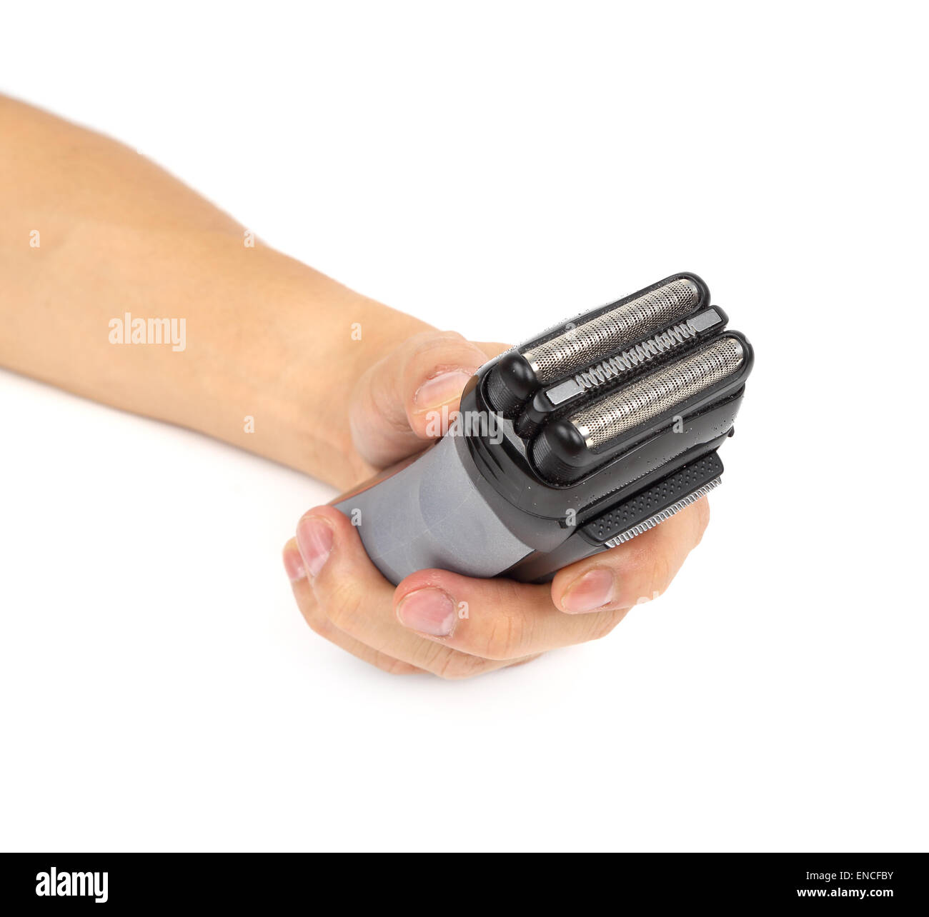 hand with electric shaver on a white background Stock Photo - Alamy