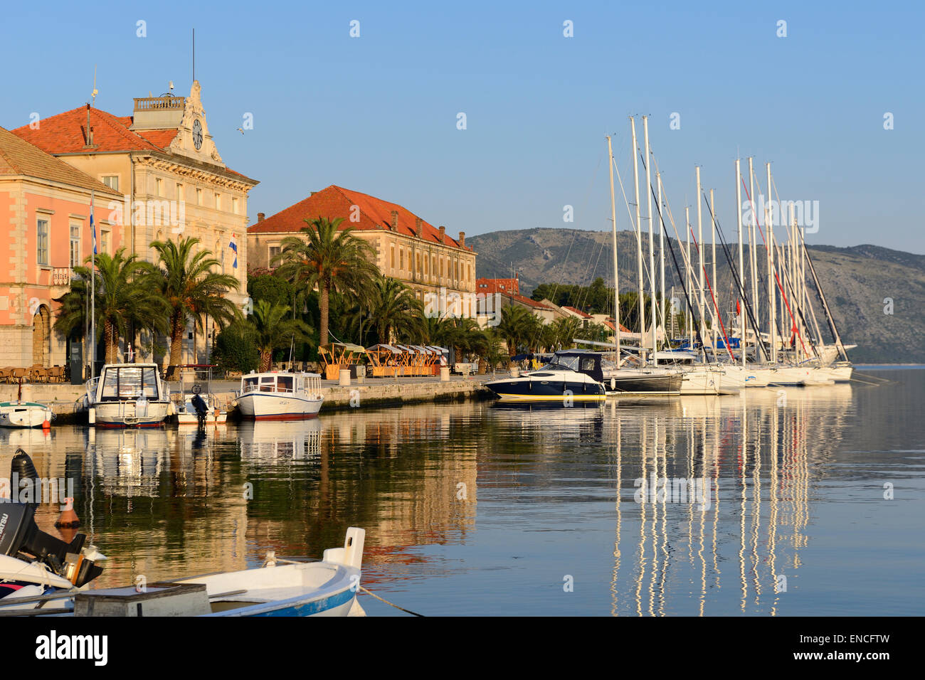 Early morning in Stari Grad harbour on Hvar Island on Dalmatian Coast ...
