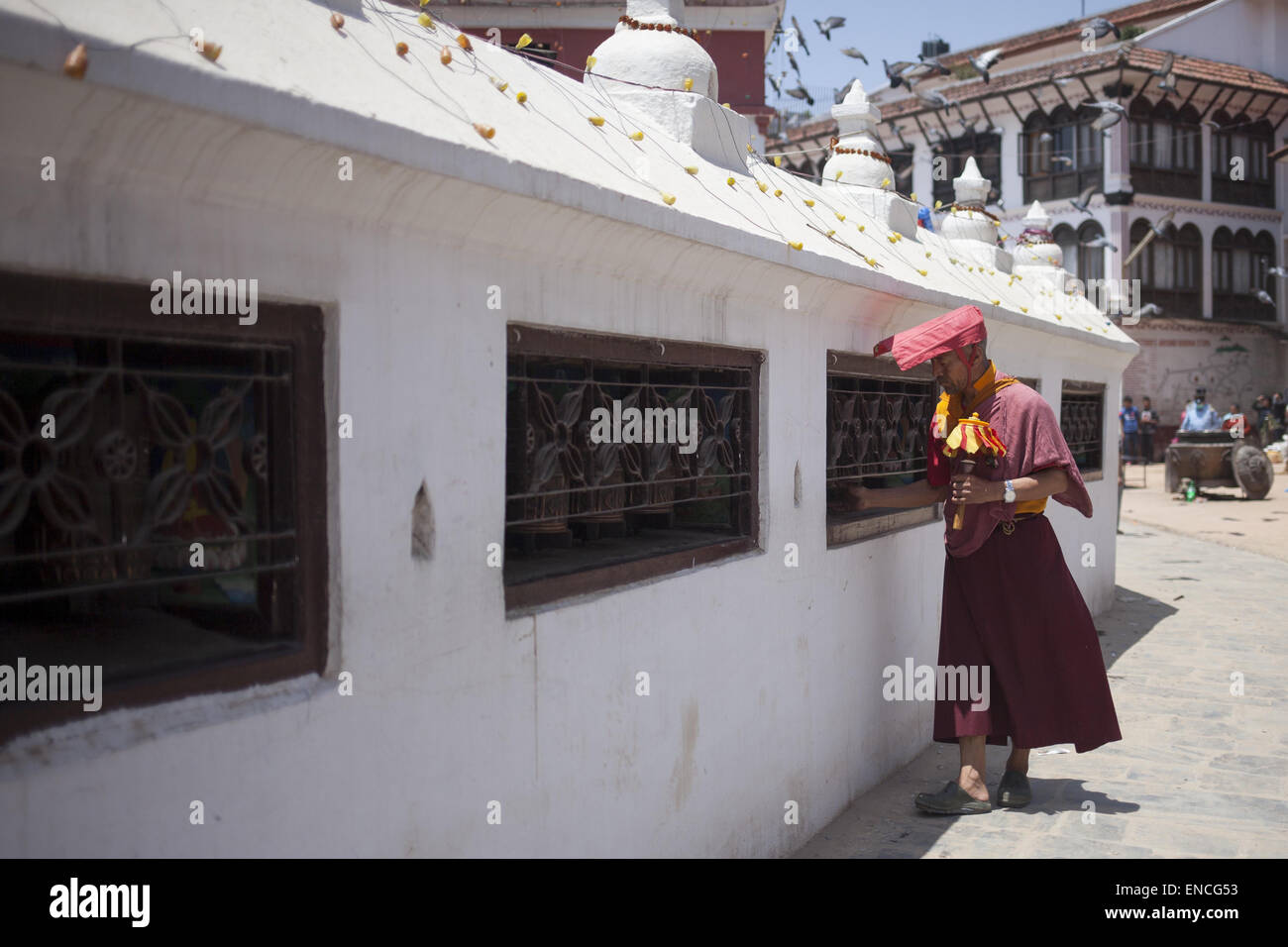 Nepal. 2nd May, 2015. A Holy man sets prays in front of at Buddha Nath ...